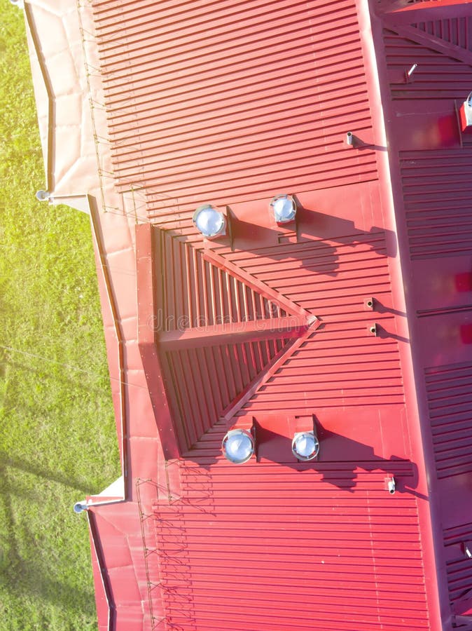The Roof of a Building Made of Iron Polymer Sheets with Ventilation ...