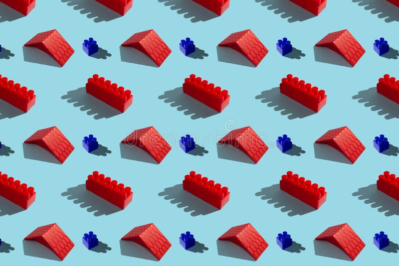 The Roof and Construction Blocks are Red and Blue on a Blue Background ...