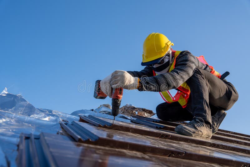 Roof Construction, Worker Install New Ceramic Tile Roof with Roofing ...