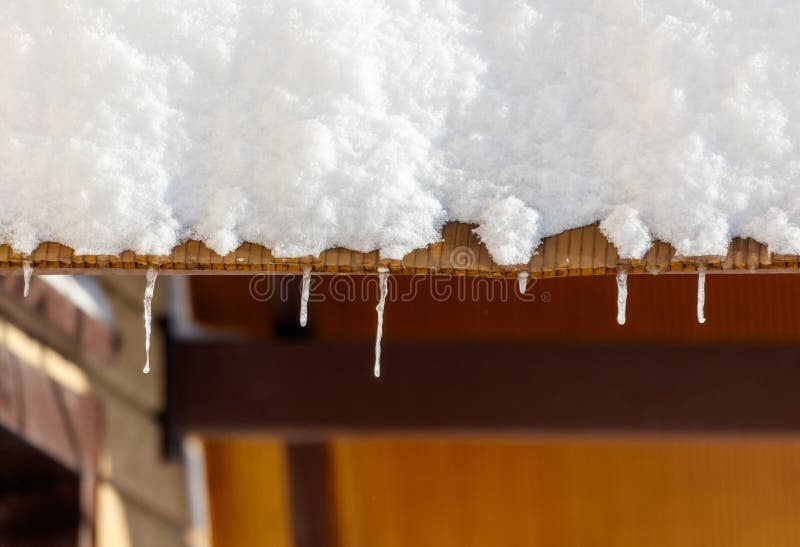 The Roof is Covered in Ice and Snow Stock Image - Image of icicles ...