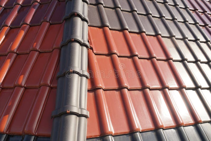 Roof Covered with Tiles in Different Colors. Roofing Stock Photo ...