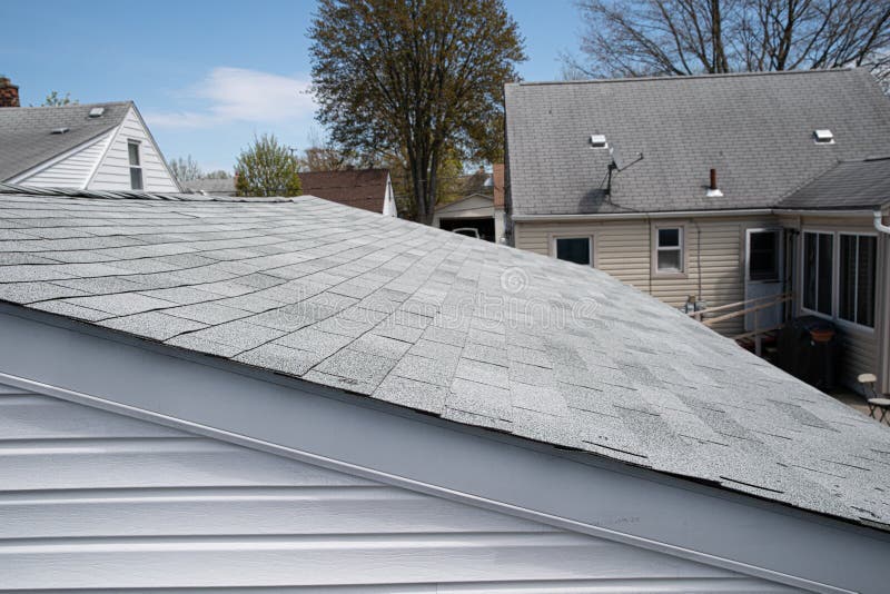 Roof Has Been Repaired with New Shingles Stock Image - Image of ...