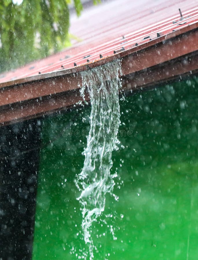 A Roof is Leaking and Water is Dripping from it Stock Photo - Image of ...