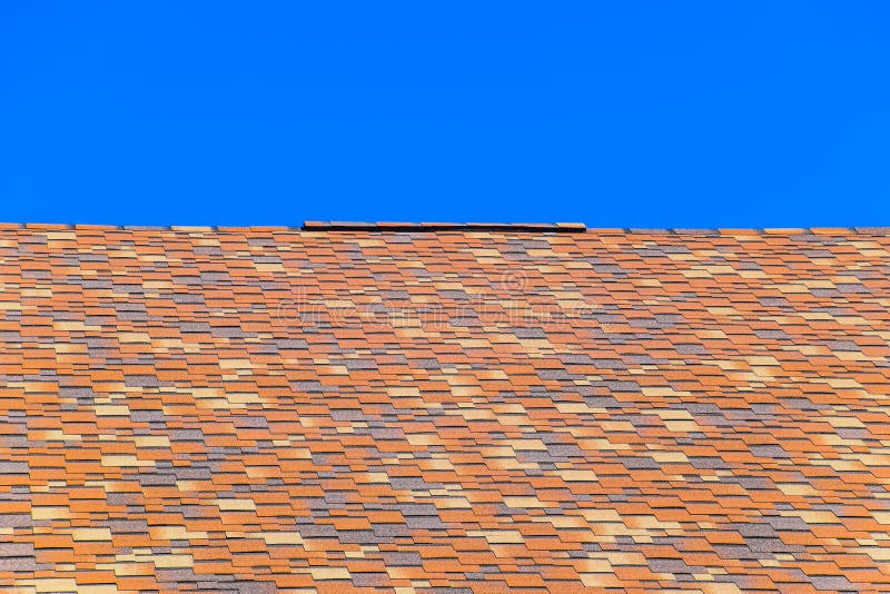 Roof from Multi-colored Bituminous Shingles. Patterned Bitumen Shingles ...