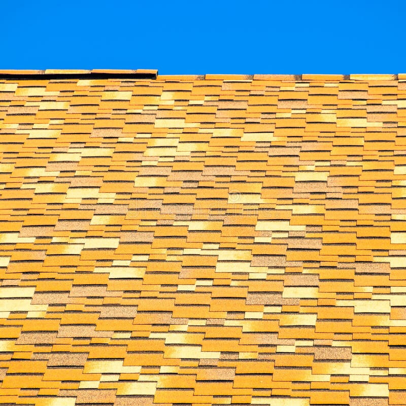 Roof from Multi-colored Bituminous Shingles. Patterned Bitumen Shingles ...