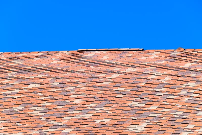 Roof from Multi-colored Bituminous Shingles. Stock Image - Image of ...
