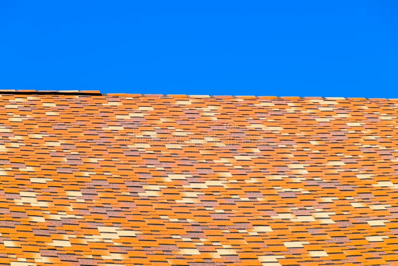 Roof from Multi-colored Bituminous Shingles. Patterned Bitumen Shingles ...