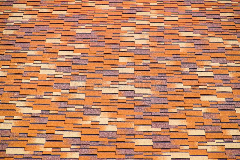 Roof from Multi-colored Bituminous Shingles. Patterned Bitumen Shingles ...