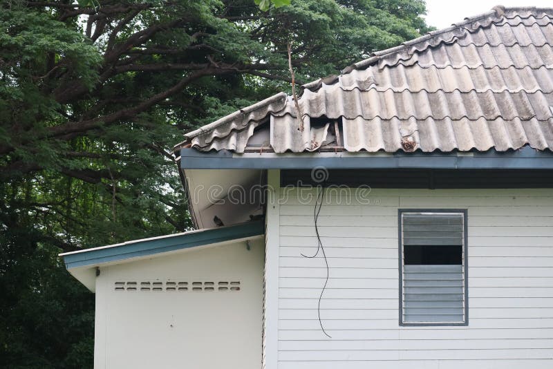 The Roof of Old House that is Broken Located in a Rural Area Stock ...