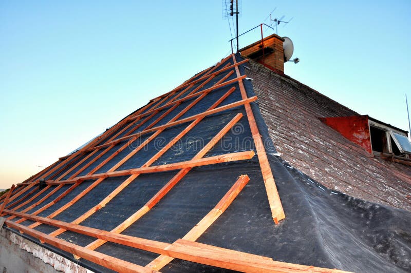 Roof Reconstruction on Elongated School Building with New Facade and ...