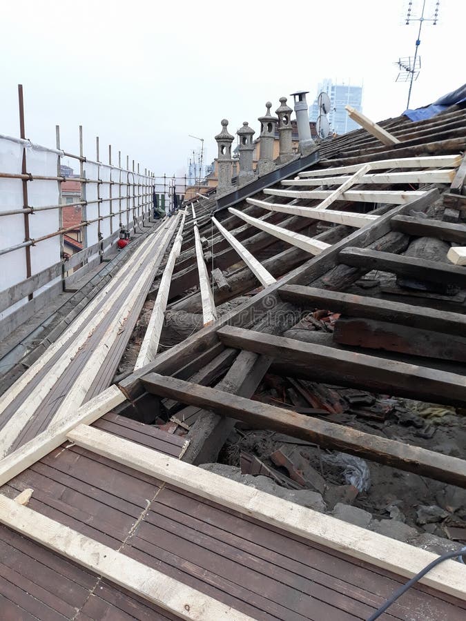 Roof refurbishment works stock image. Image of building - 213319603