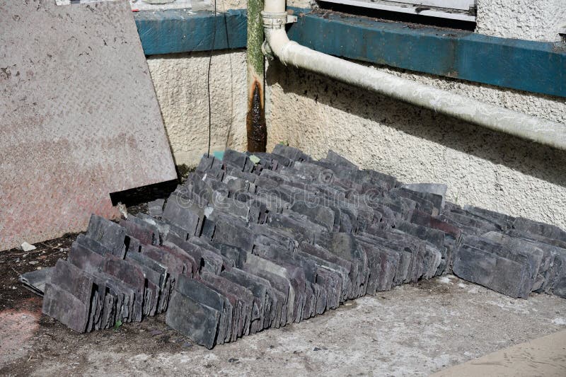 Roof Slates in a Row Ready for New Roof Construction Stock Image ...