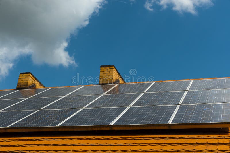 Roof with solar cells stock image. Image of chimneys - 20003937