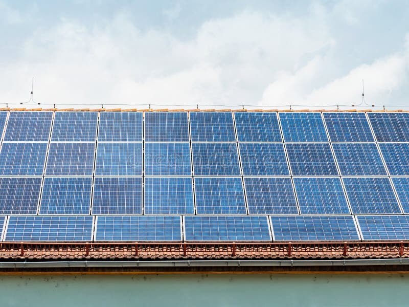 Roof with Solar Panel Reflecting the Sun Light in the Perfect Sky Stock ...
