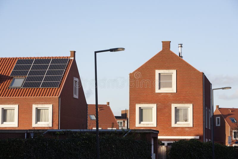Roof with Solar Panels in a Residential District Stock Photo - Image of ...