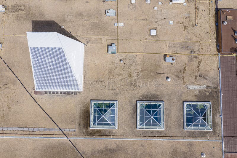 Roof with Three Skylights and a White Roof Stock Image - Image of ...