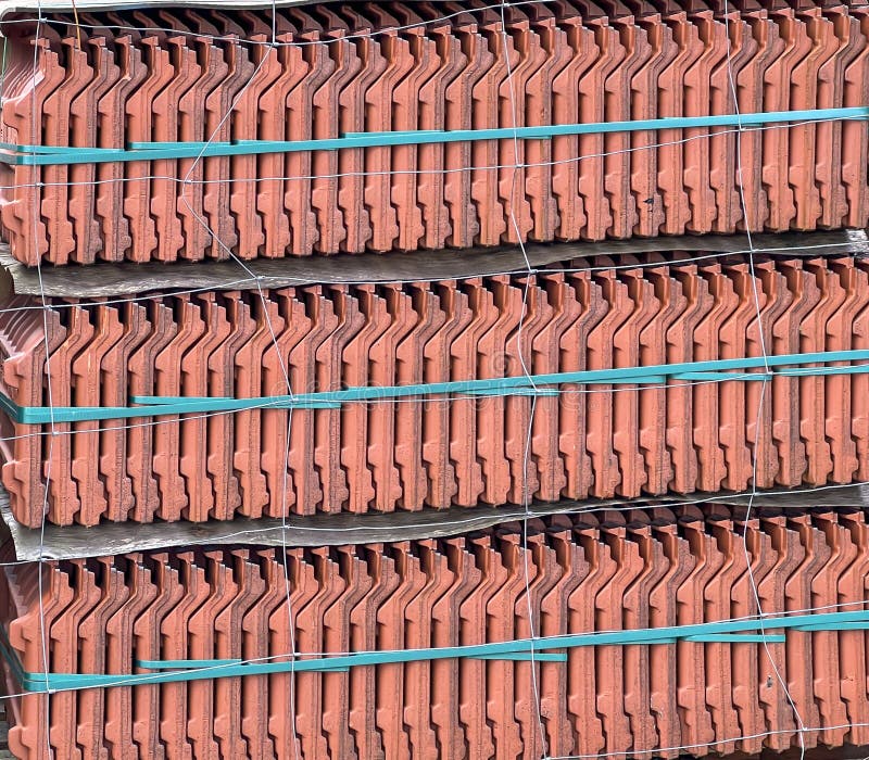 Roof Tiles Stacked on a Pallet, Visible from the Side As a Background ...