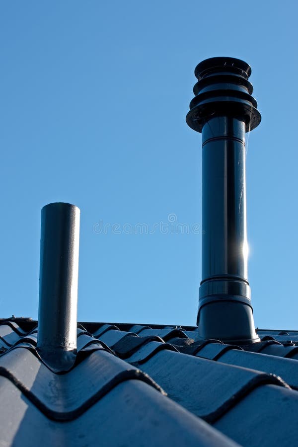 Roof with Ventilation Pipe and Flue Terminal Stock Photo - Image of ...