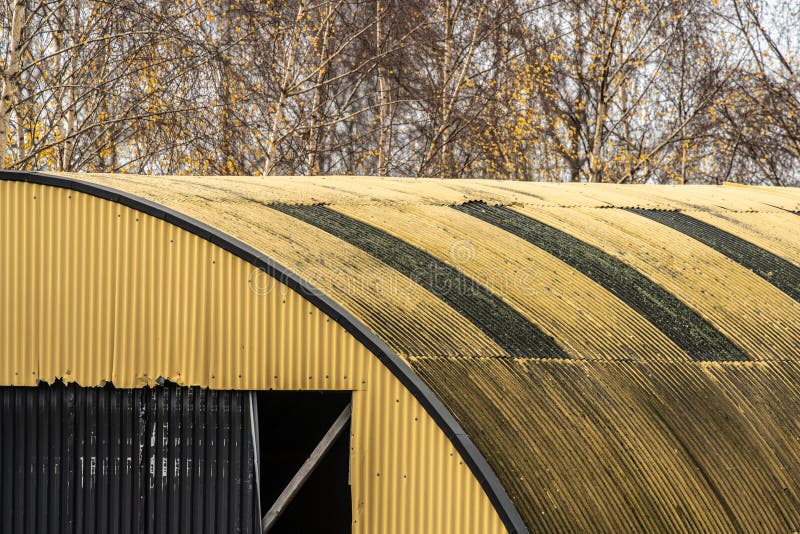 Roof of a Yellow Semicircular Metal Shed.. Stock Photo - Image of wall ...