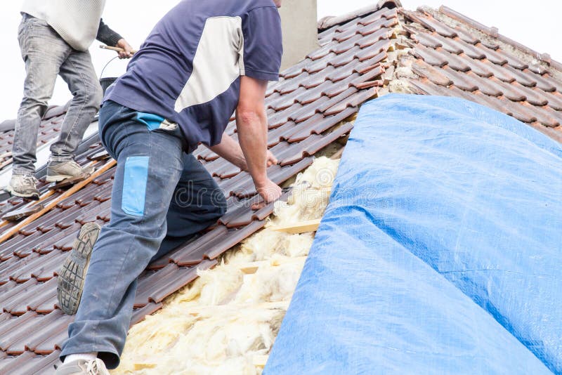 A Roofer Laying Tile on the Roof Stock Photo - Image of contractor ...