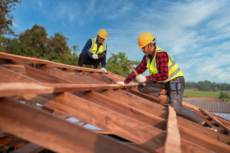 Roofer, Two Roofer Carpenter Working on Roof Structure on Construction ...