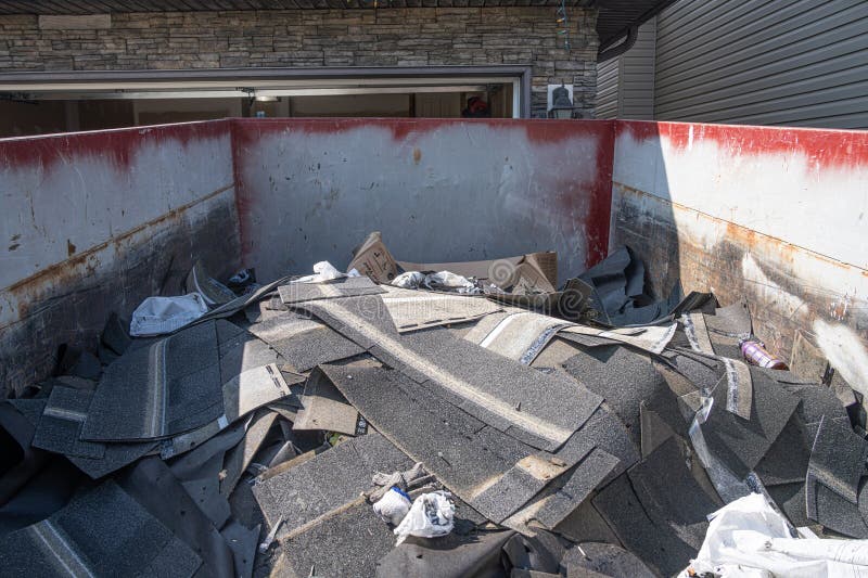 Roofing Shingles Damaged by Hailstorm in Garbage Bin Stock Image ...