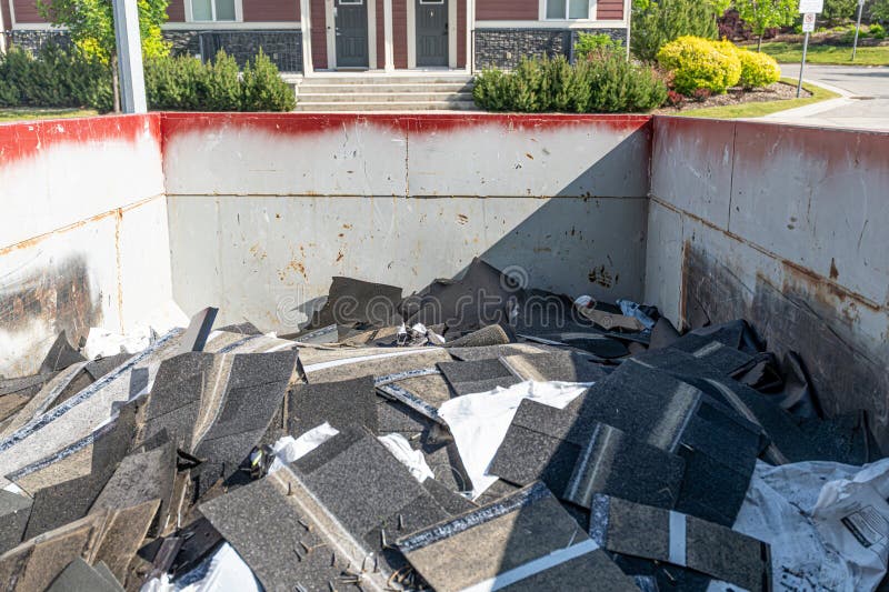 Roofing Shingles Damaged by Hailstorm in Garbage Bin Stock Image ...