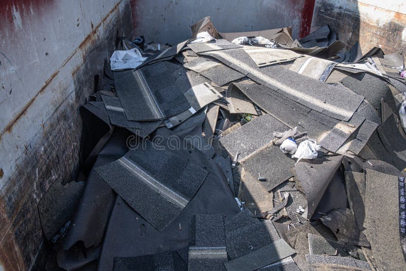 Roofing Shingles Damaged by Hailstorm in Garbage Bin Stock Image ...