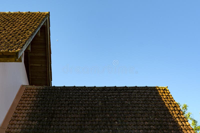 The Roofs on Background of Blue Sky Stock Photo - Image of cumulus ...