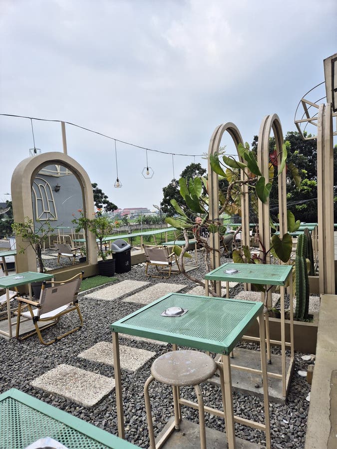 A Rooftop Cafe Filled with White Tables Stock Image - Image of tables ...