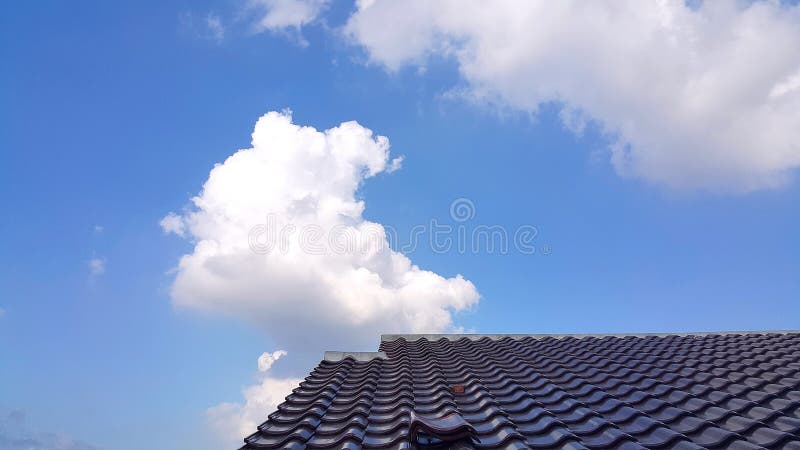 Rooftop and clear blue sky stock image. Image of background - 282167851