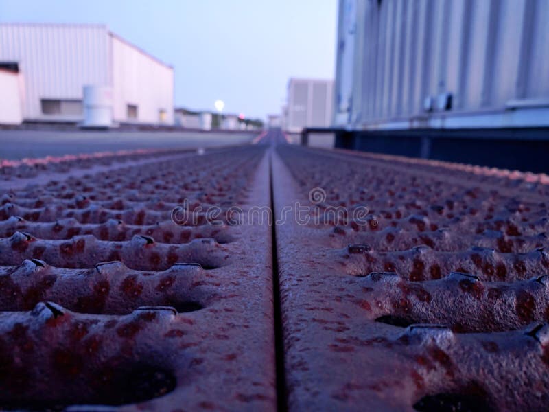 Rooftop grating walkway stock image. Image of lines - 154840643