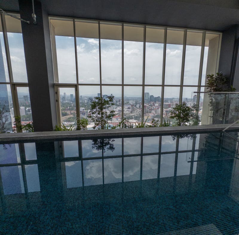 Rooftop Pool with Cityscape View Stock Photo - Image of pool, cityscape ...
