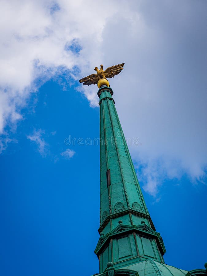 A Rooftop with Two Headed Eagle Statue with Blue Sky in the Background ...