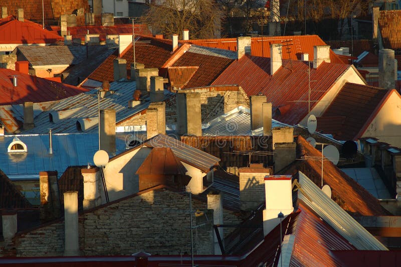 Rooftops stock photo. Image of sunset, roof, colorful, town - 50506