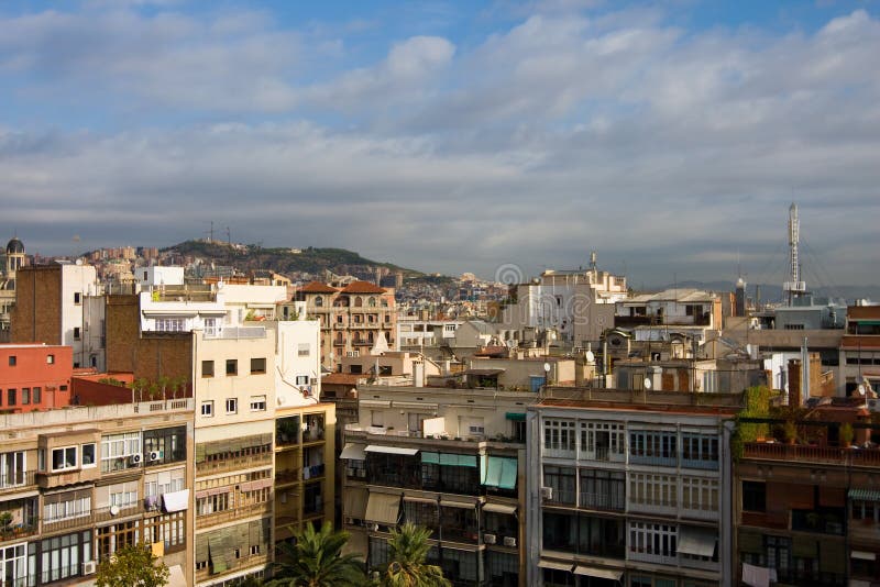 Rooftops of Barcelona stock image. Image of cloudscape - 22222319