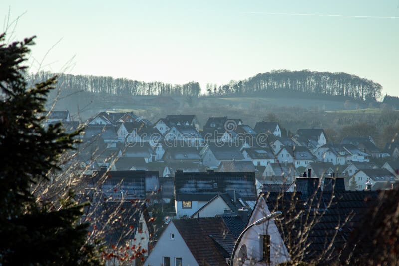 Rooftops of a small town stock photo. Image of painted - 168733796