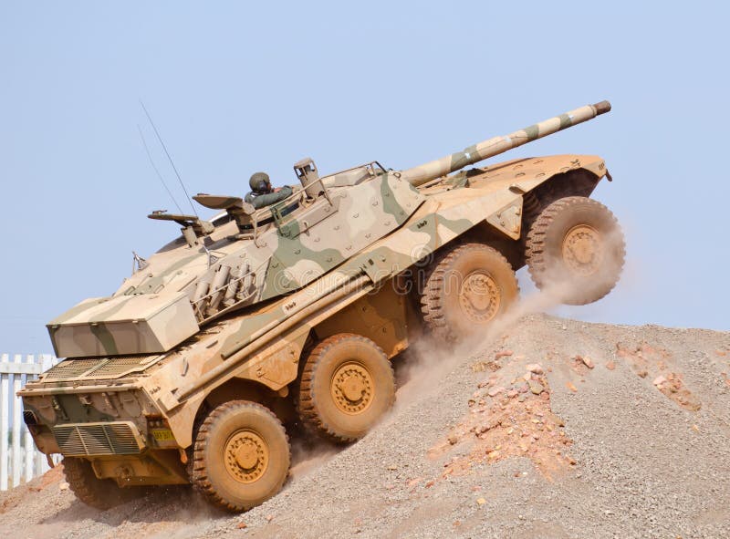 Rooikat ramping an incline editorial photo. Image of antiarmour - 27253901