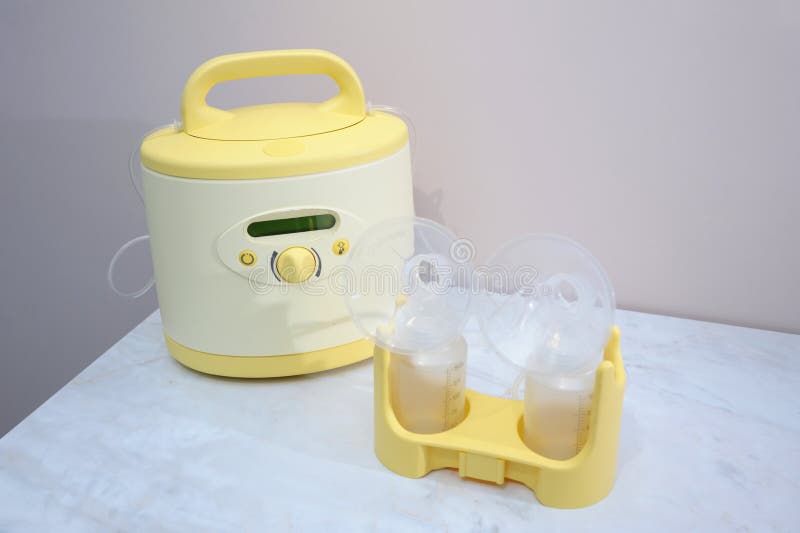 At the Room for Breast Milk Taking: Electric Milk Pump Placed on a ...