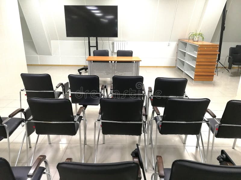 A Room with Chairs and a TV for Educational Purposes. Stock Photo ...