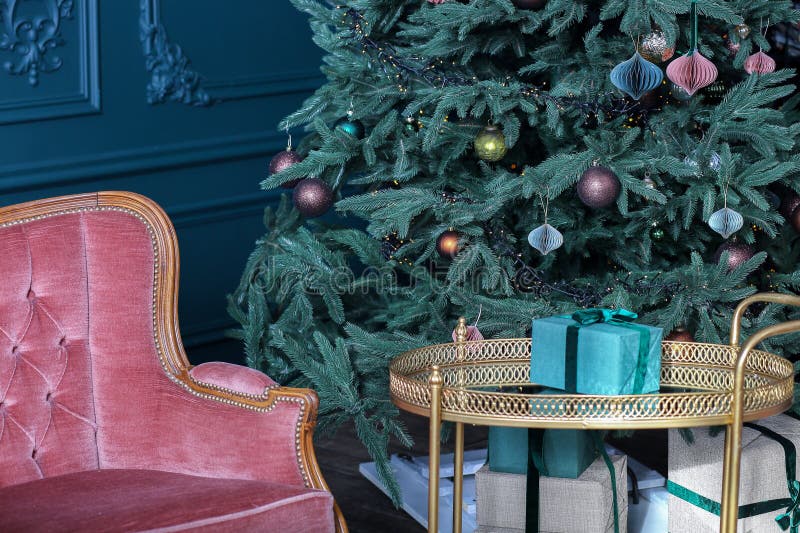 A Room with a Christmas Tree and a Comfortable Sofa for the Holidays ...