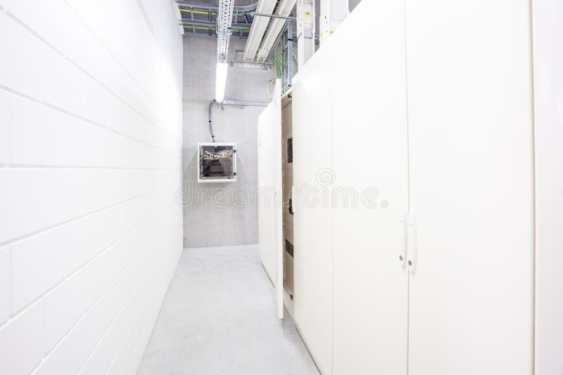 Room with electrical boxes stock image. Image of basement - 73765867