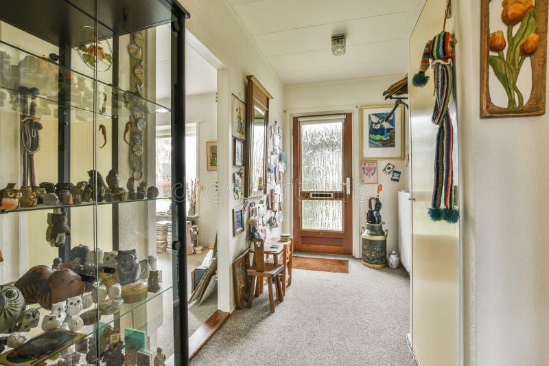 A Room with a Glass Display Case Filled with Artifacts Editorial Stock ...
