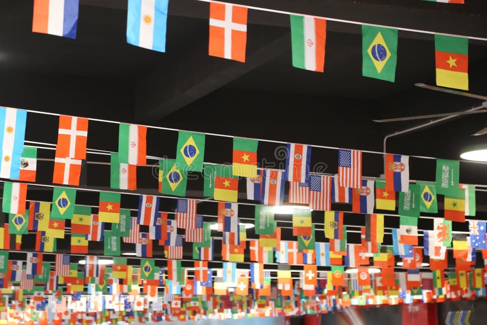 A Room with Many Flags Hanging from the Ceiling Stock Photo - Image of ...
