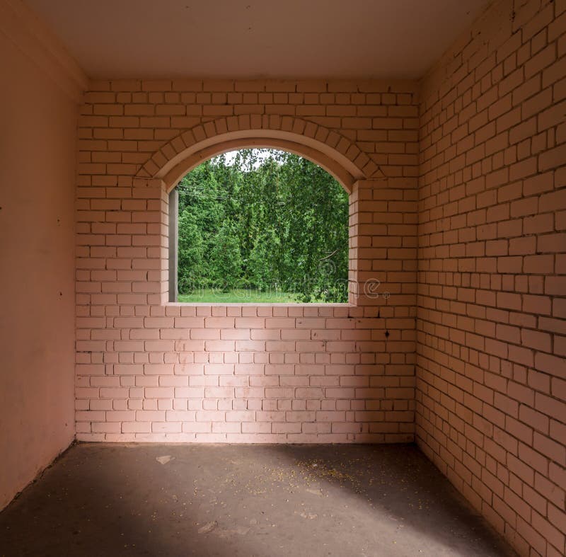 The Room is Painted in Light Pink Brick with a Semicircular Window ...