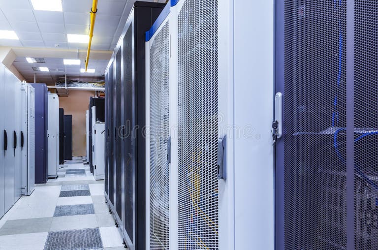 Room with Rows of Server Hardware in Big Modern Data Center Corridor ...