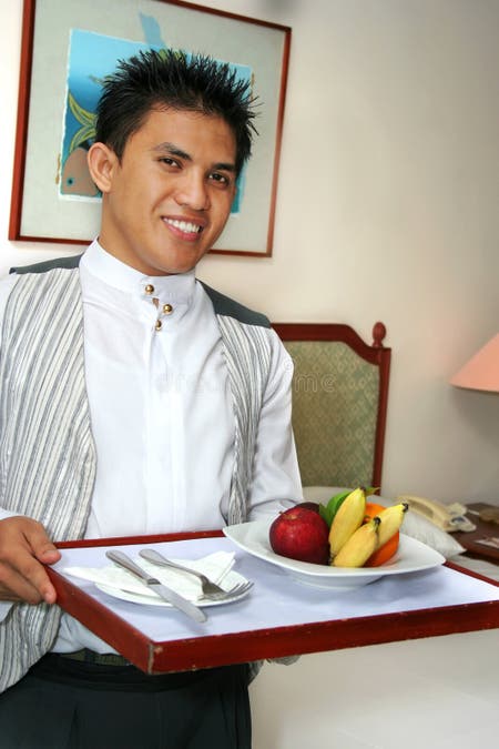 Room Service Staff Bringing Fruit Stock Photo - Image of butler ...