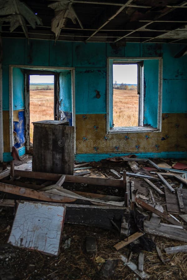 The Room is in a State of Disarray, with Broken Furniture Stock Photo ...