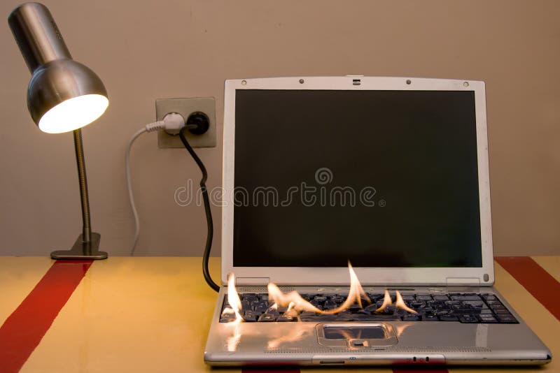 In the Room on the Table the Laptop Caught Fire, the Ignition of the ...