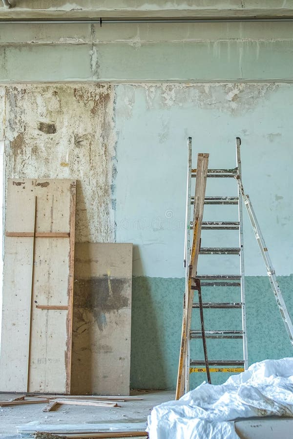 Room Under Construction with Primed Walls Painter S Ladder and Drop ...